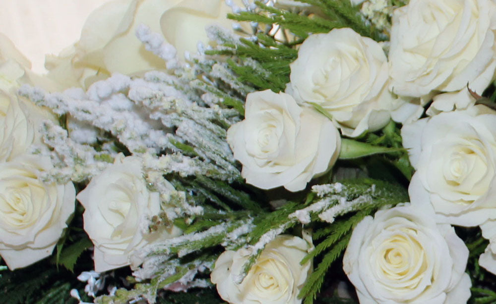 The White Christmas arrangement by Lia’s Flowers brings a touch of ...